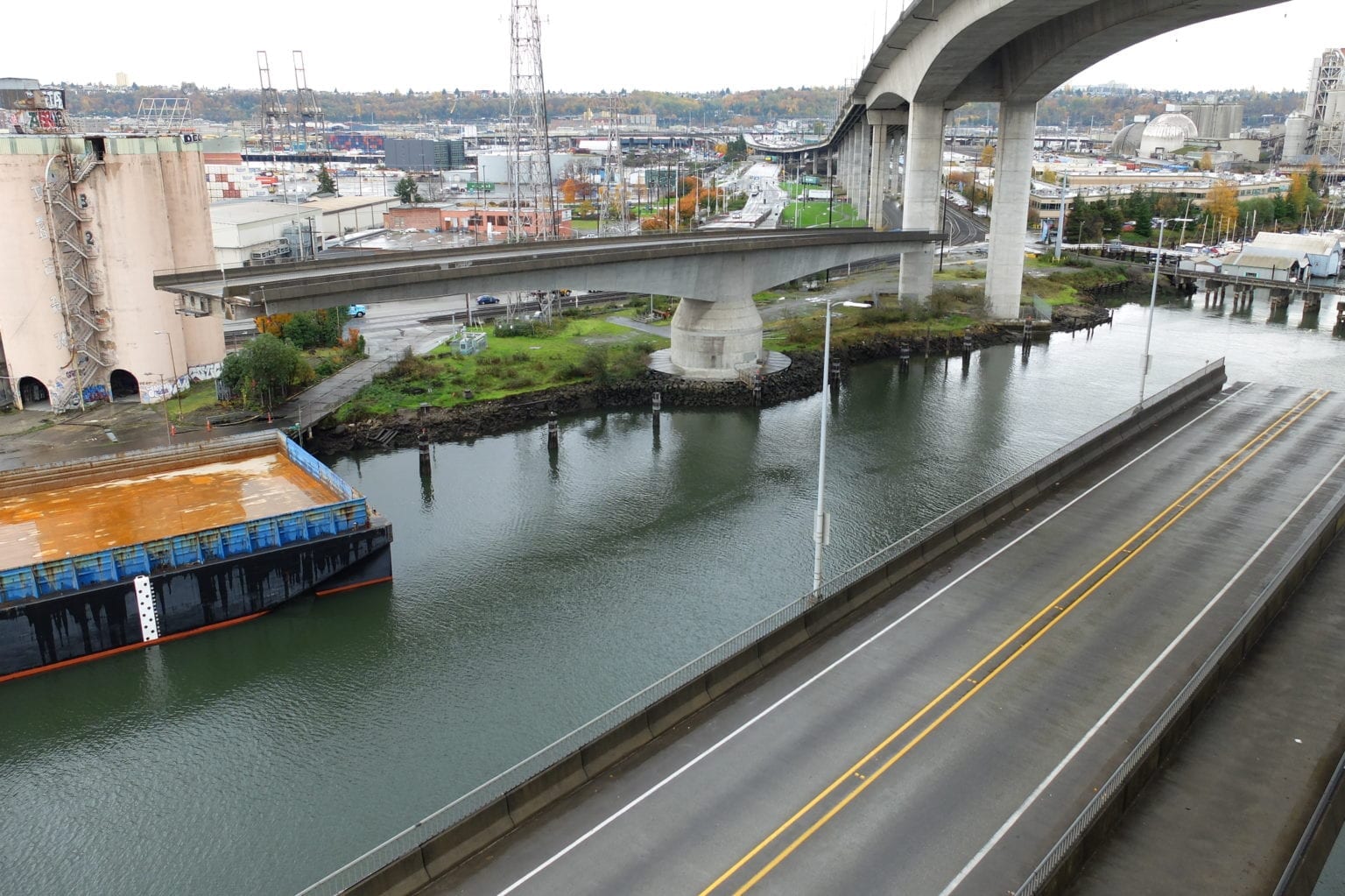 Signs going up on low bridge Oct. 24 alerting drivers of photo ...